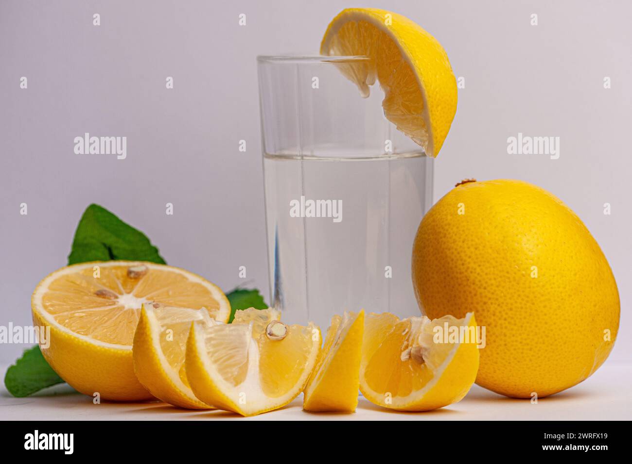 The picture of the lemon fruit, cut into several slices, gives us an ...