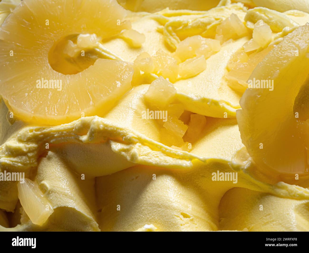 Frozen Pineapple flavour gelato - full frame detail. Close up of a ...