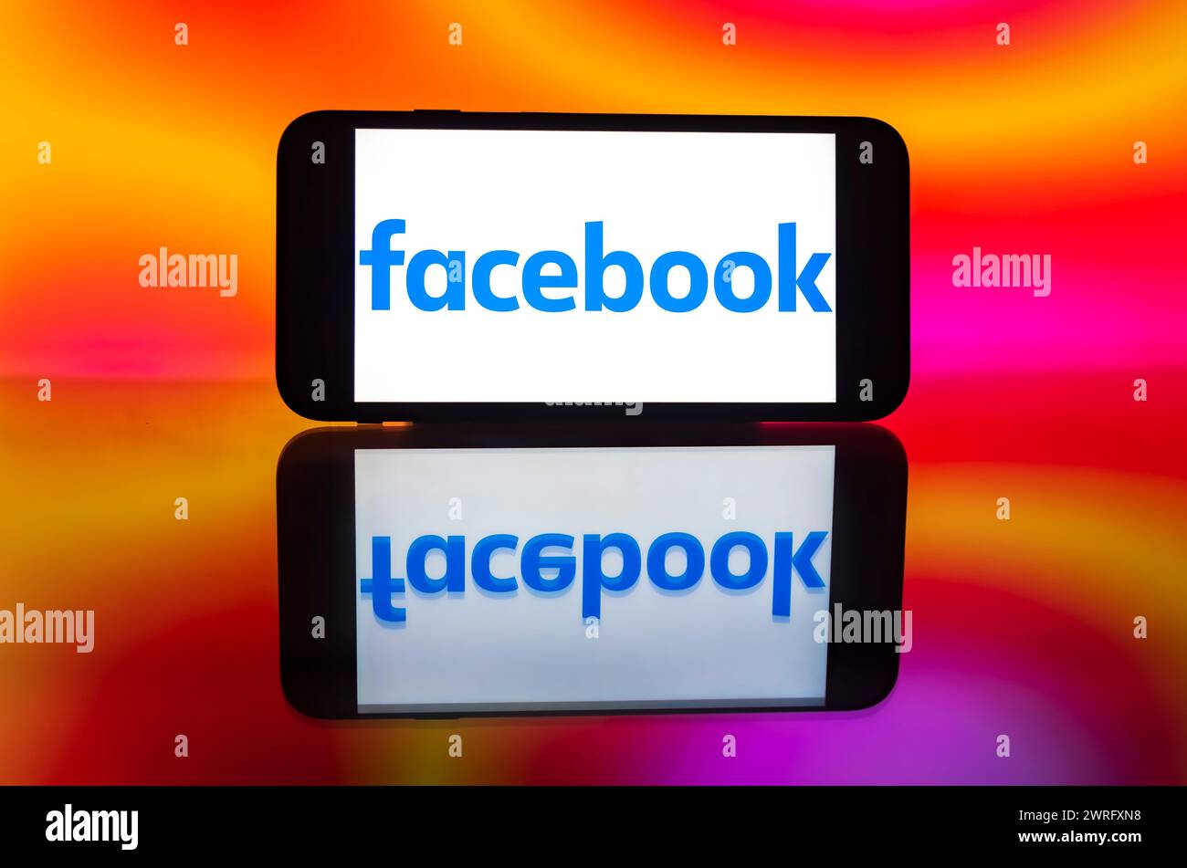 In this photo illustration, the Facebook logo is seen displayed on a ...