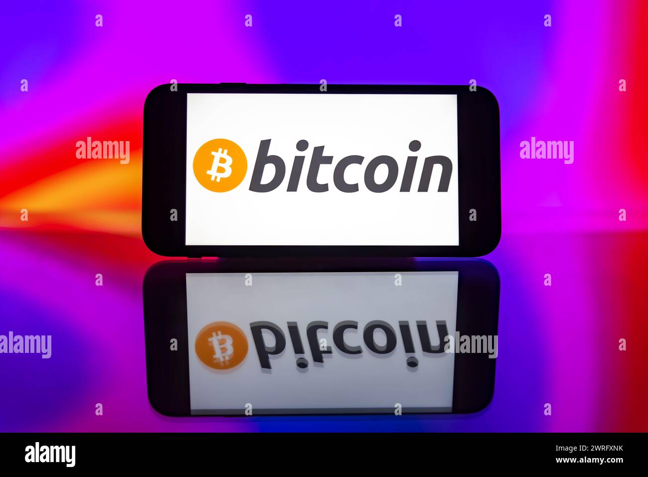 In this photo illustration, the Bitcoin logo is seen displayed on a ...