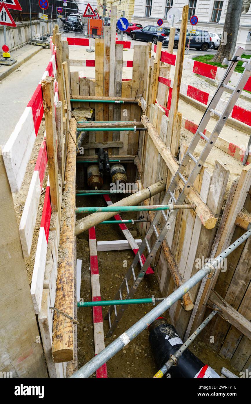 Replacement of underground heating pipes, deep trench with sliding equipment to support the ...