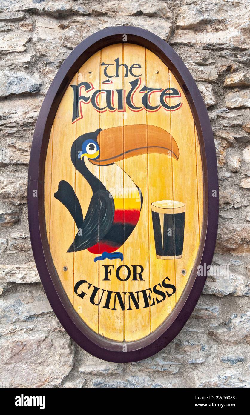 Ireland, County Kerry, Ring of Kerr,y Kenmare, pub Guinness sign Stock ...