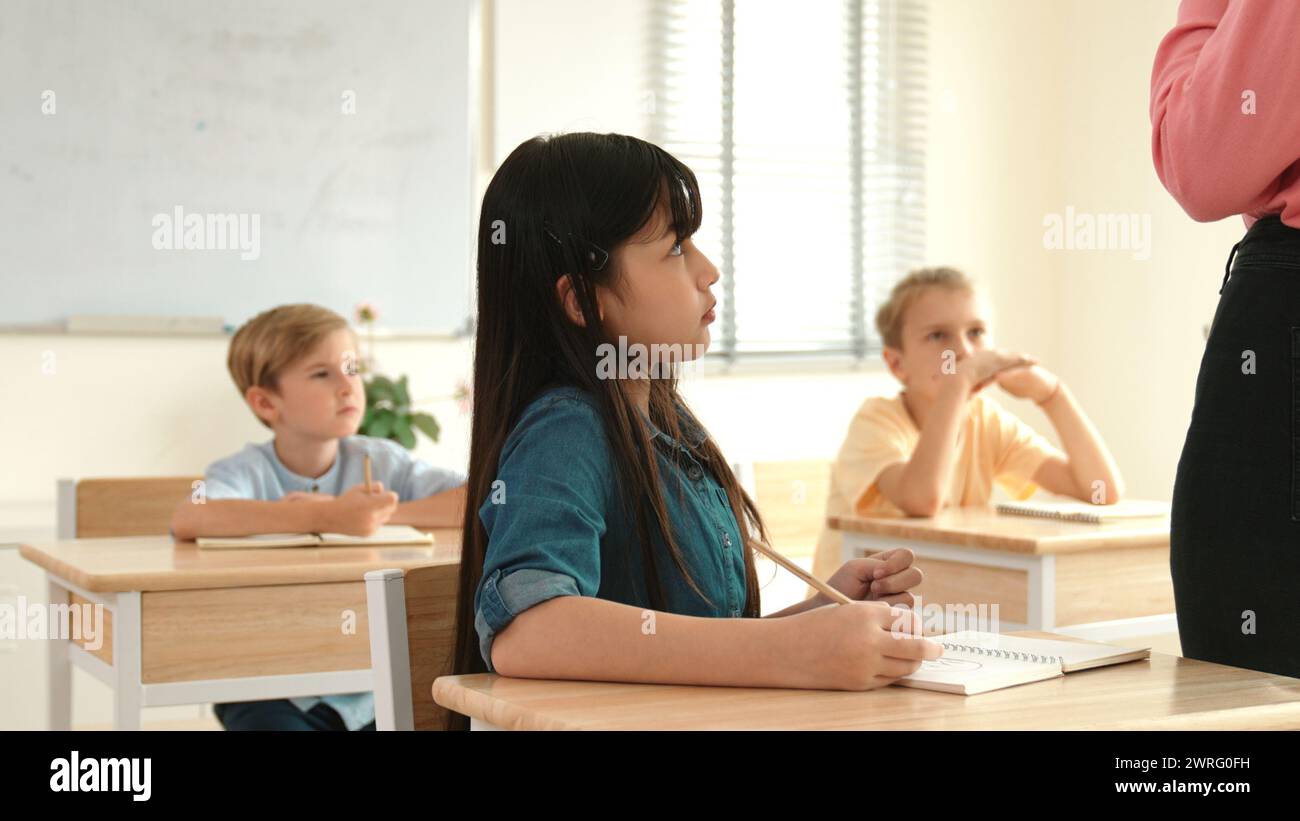 Happy asian boy raising hand hi-res stock photography and images - Alamy