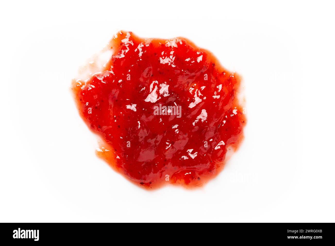 Raspberry jam spread isolated over white background Stock Photo - Alamy