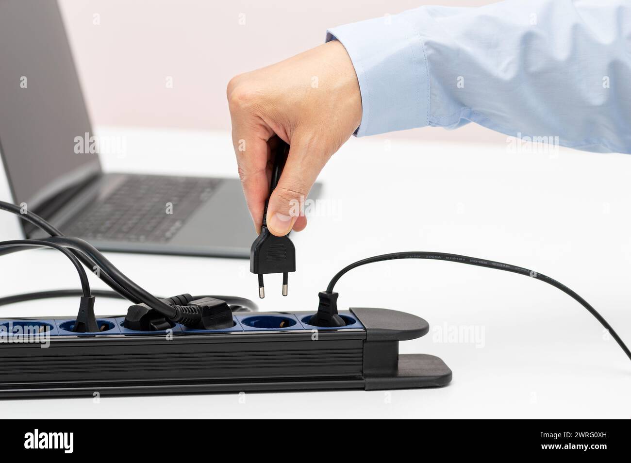 Woman hand plugging hi-res stock photography and images - Alamy