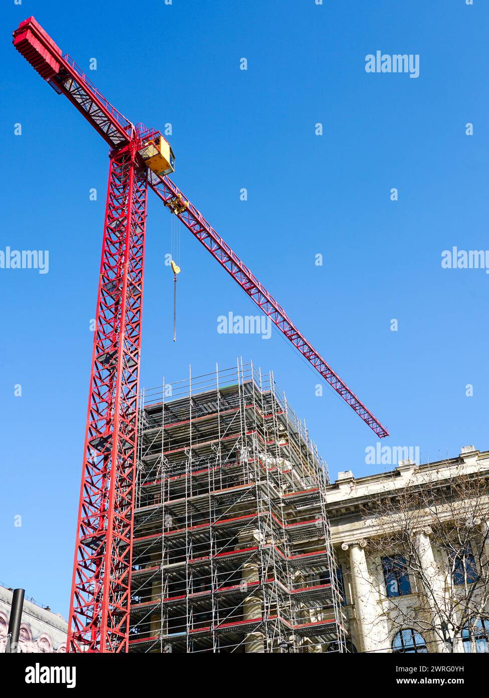 Historical house renovation and repair view using scaffolding and high ...