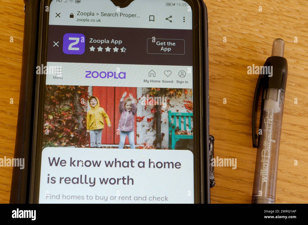 Zoopla Online Estate Agent on a Smartphone, UK Stock Photo - Alamy