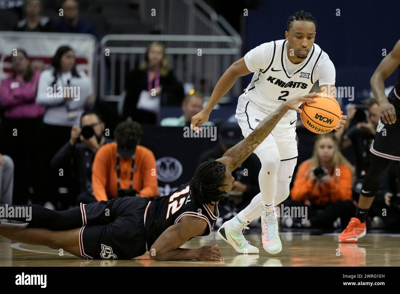 Oklahoma State guard Javon Small (12) and UCF guard Shemarri Allen (2 ...