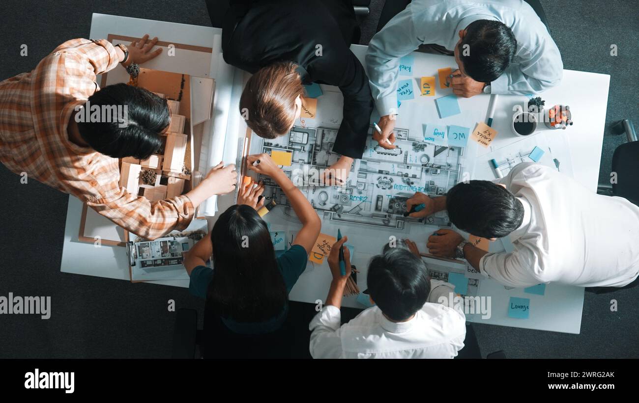 Top aerial view of project manager or civil engineer writing at ...