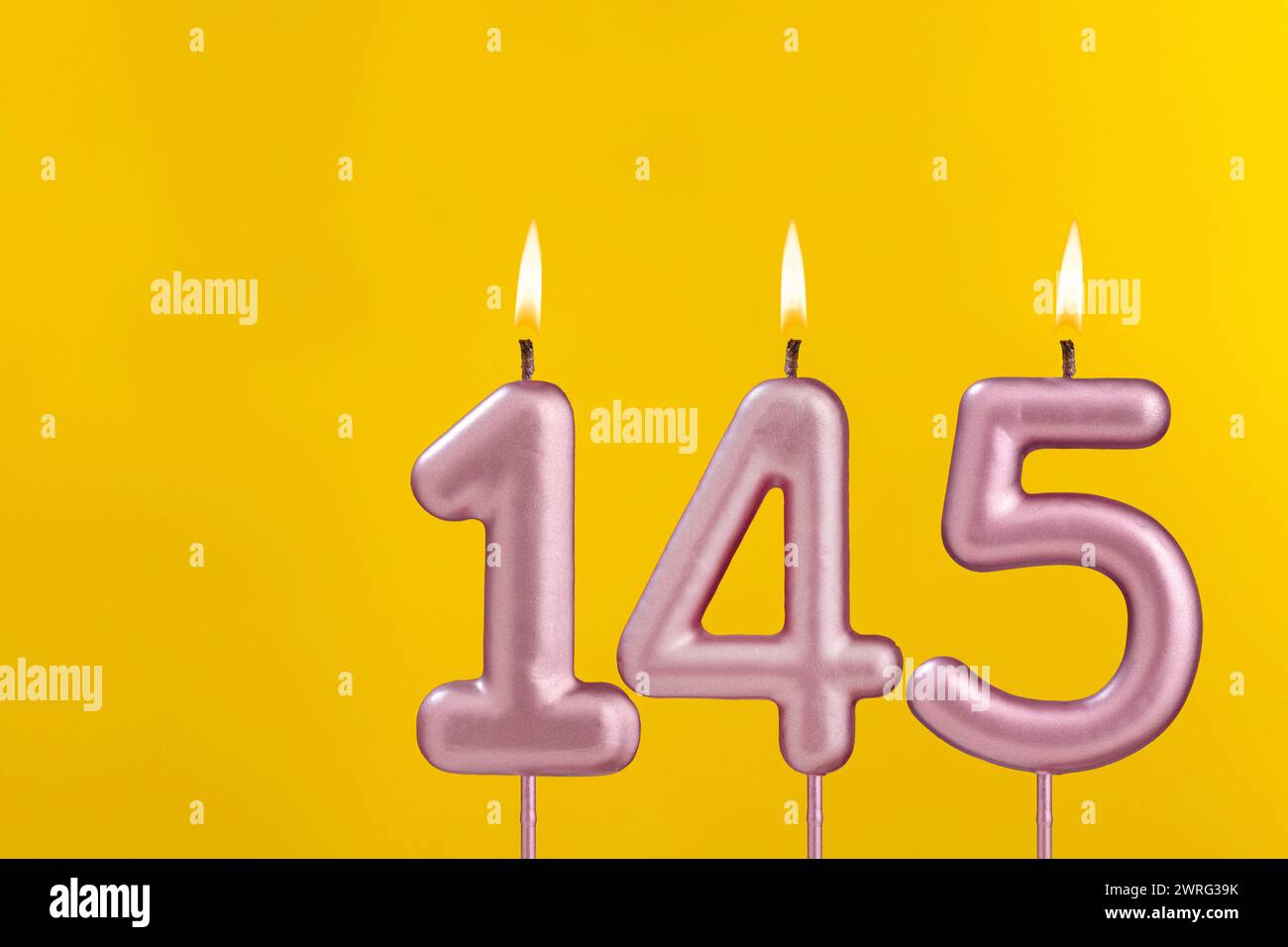 Birthday candle number 145 - Birthday celebration on yellow background ...