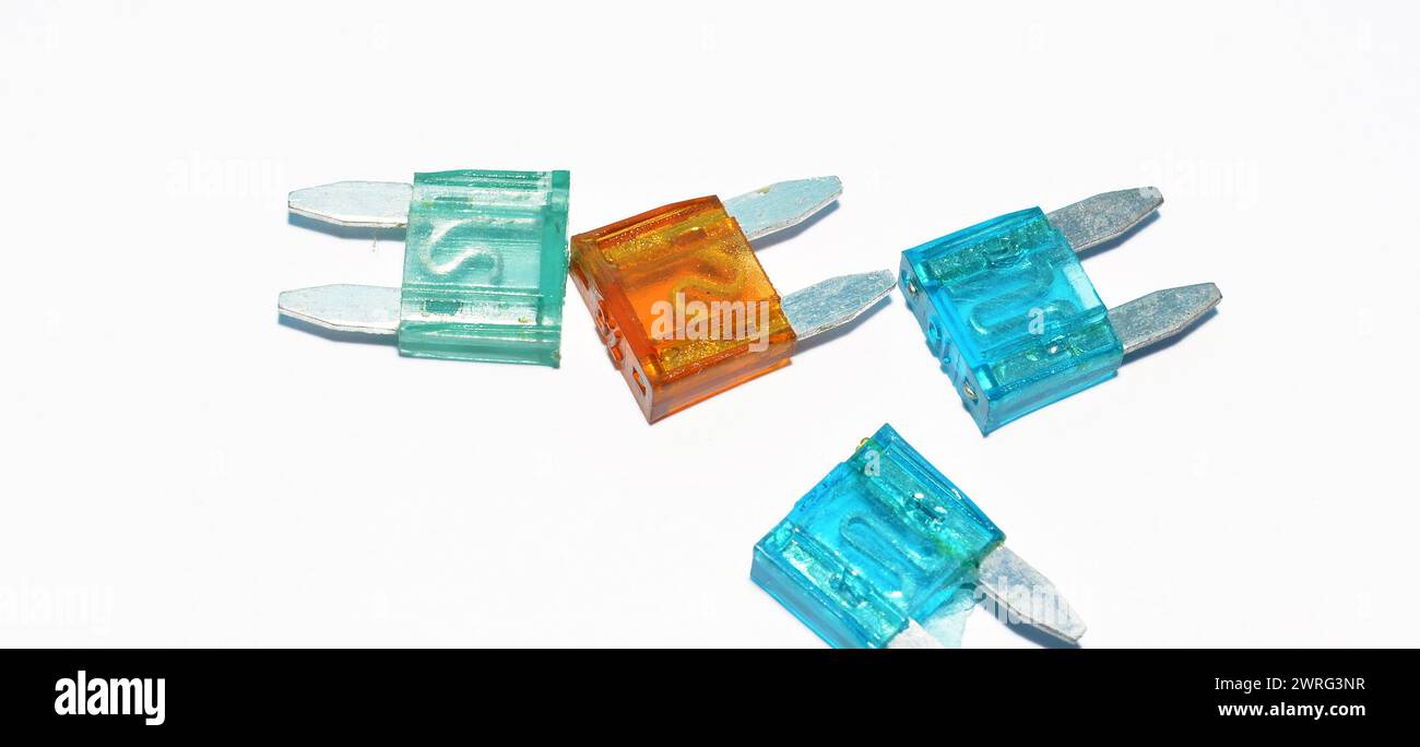 Vintage mini car fuses on white background Stock Photo - Alamy