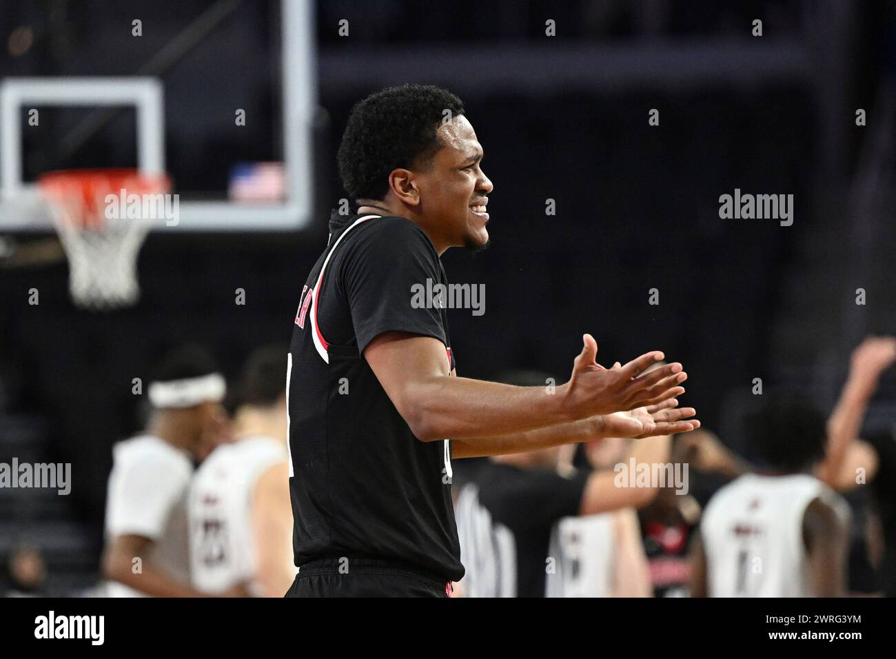 Denver Pioneers guard Tommy Bruner (0) reacts to the bench after ...