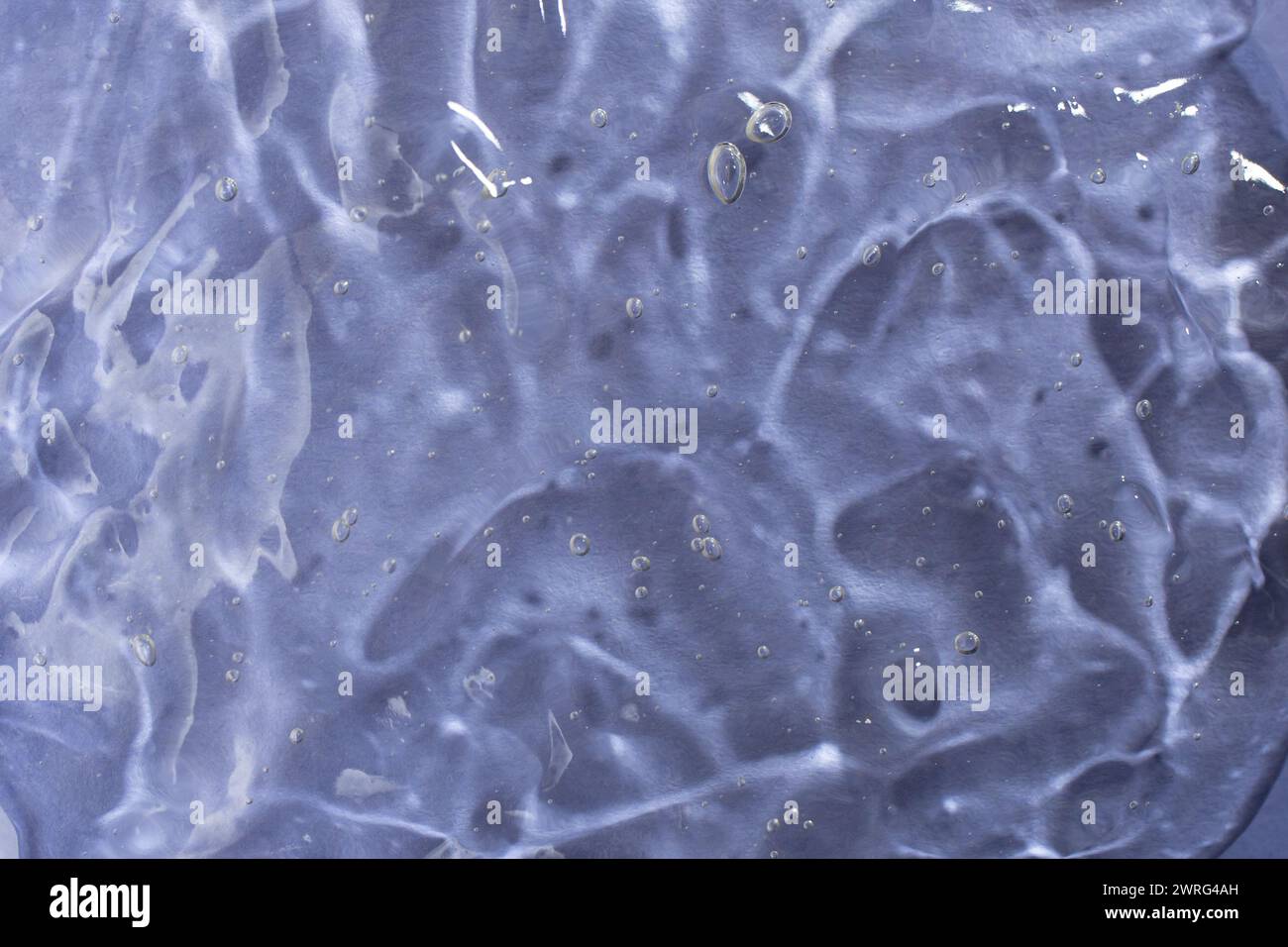 gel structure on purple background, backdrop for cosmetic products ...