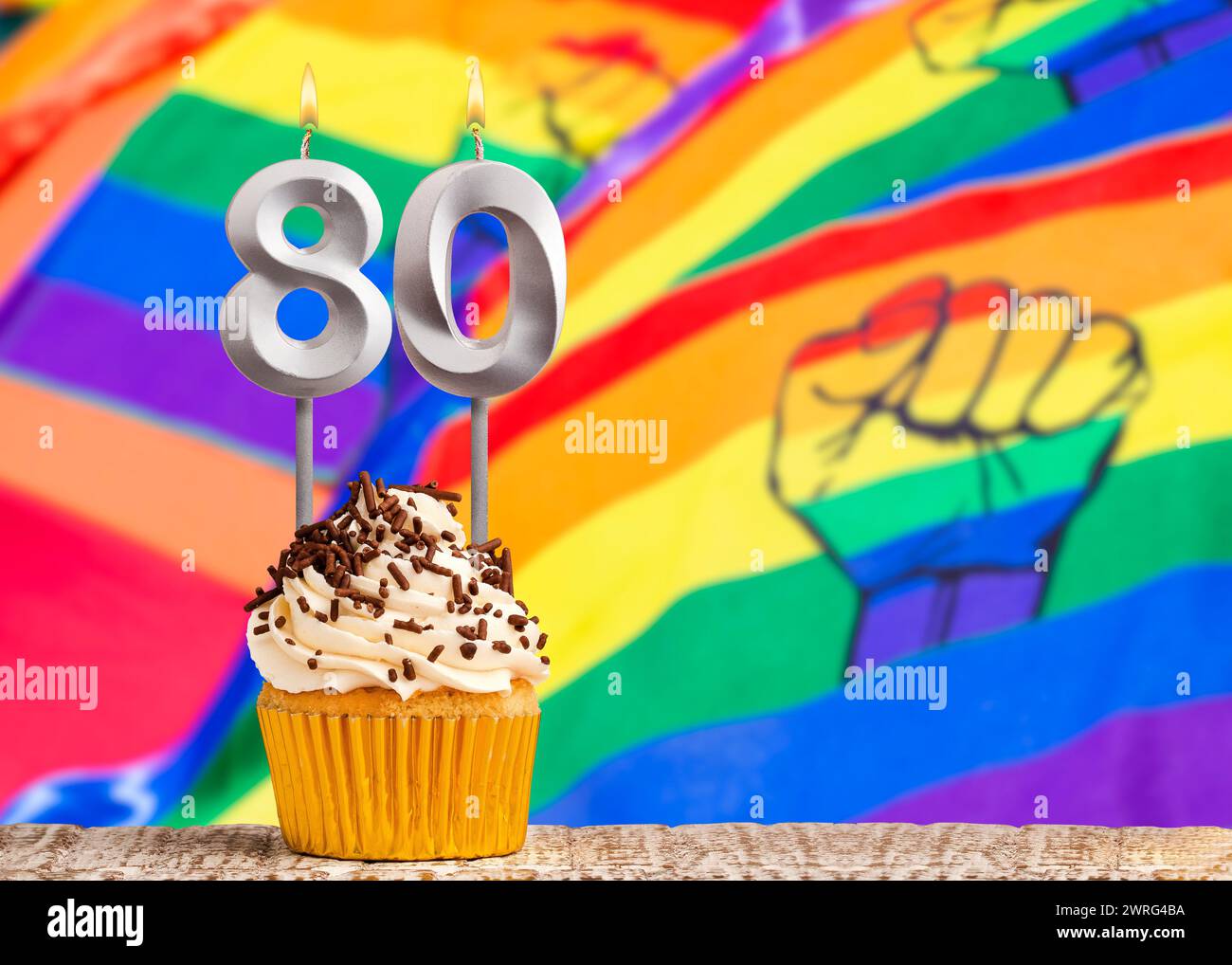 Birthday candle number 80 - Gay march flag background Stock Photo - Alamy