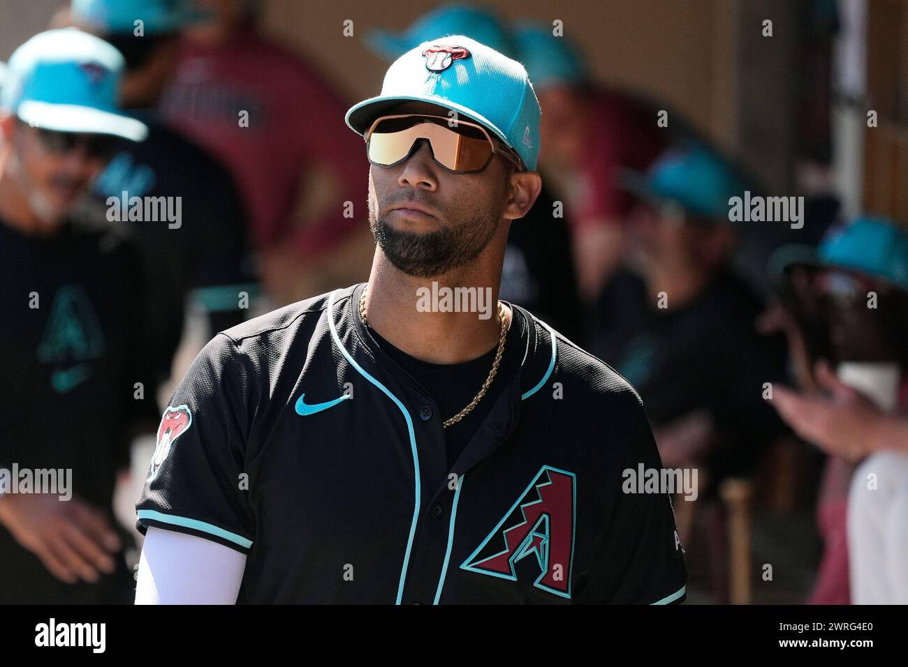 Arizona Diamondbacks' Lourdes Gurriel Jr. walks through the dugout ...