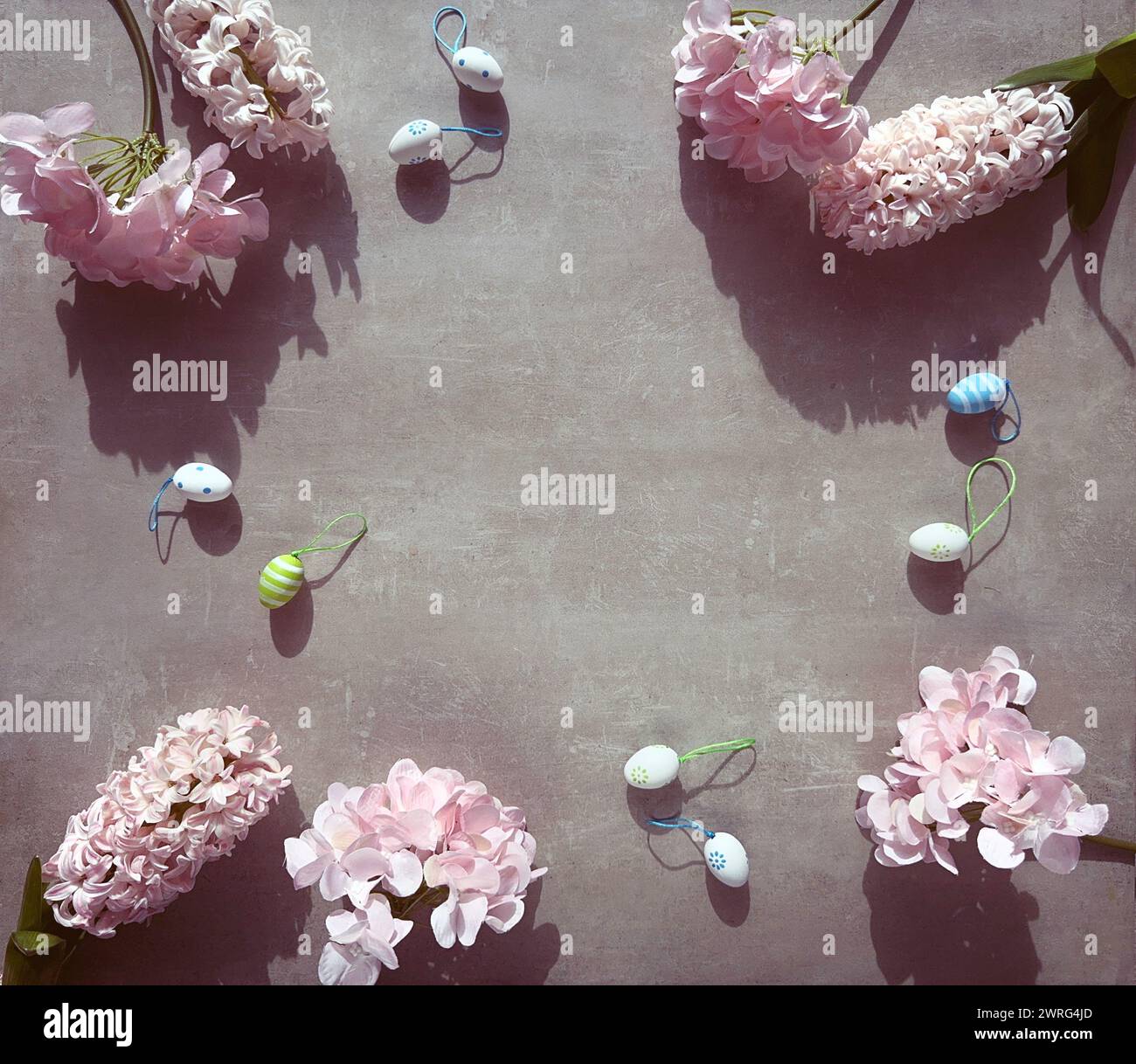 A group of pink spring flowers hyacinth and hydrangea sitting neatly ...