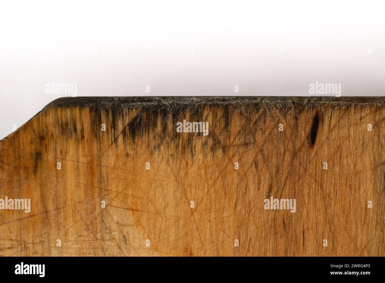 Wooden chopping board with cut marks and black mold, cloae up Stock ...
