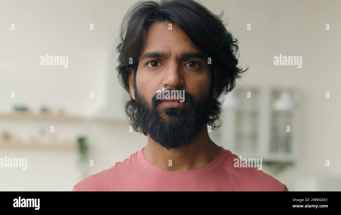 Close up head shot Arabian muslim guy stand in kitchen room. Portrait ...