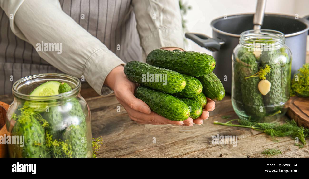 Woman canning vegetables in hi-res stock photography and images - Alamy
