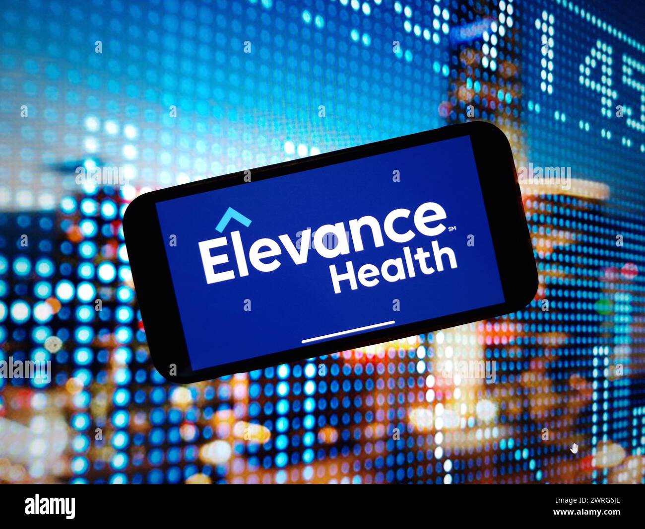 In this photo illustration, the Elevance Health company logo is seen displayed on a smartphone ...