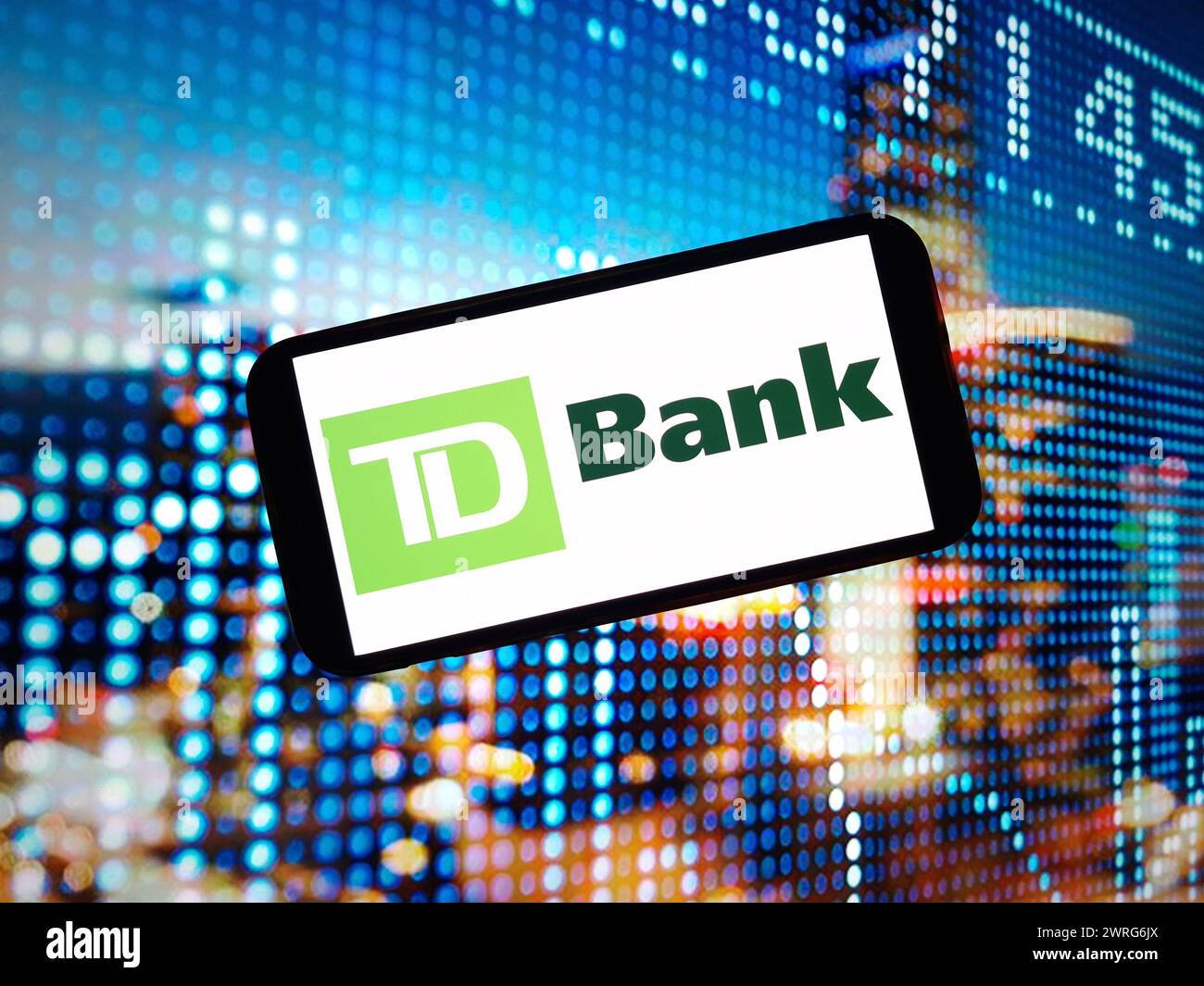 In this photo illustration, the Toronto Dominion Bank logo is seen ...