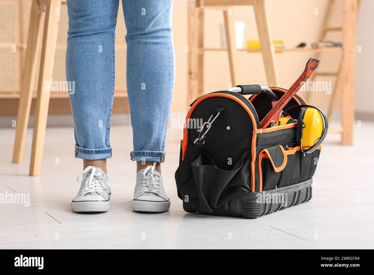 Female worker bag tools hi-res stock photography and images - Alamy