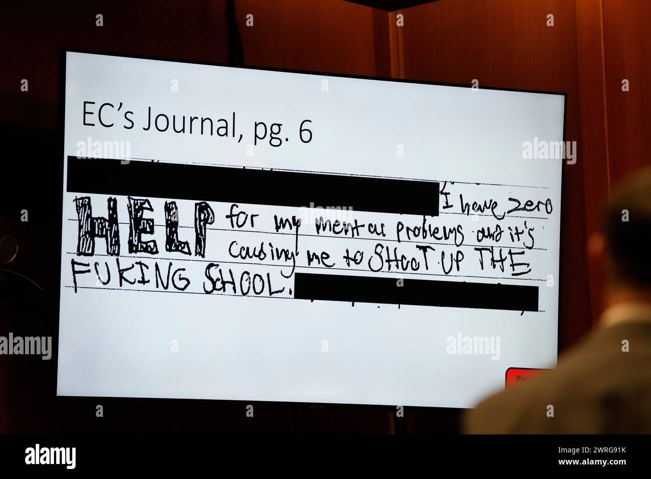 In a frame grab from video, a journal entry from Ethan Crumbley is ...