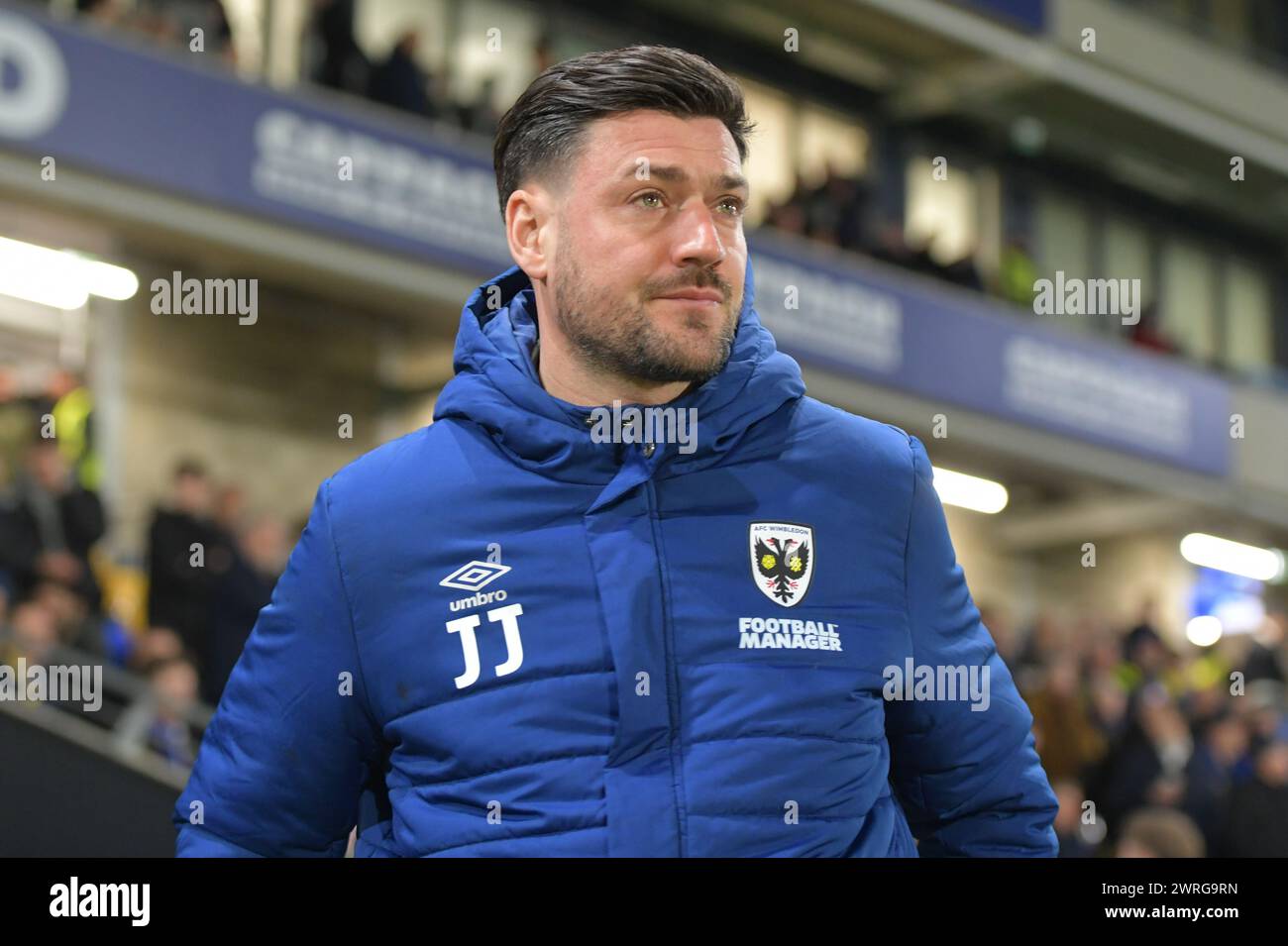 London, England. 12th Mar 2024. AFC Wimbledon Manager Johnnie Jackson ...