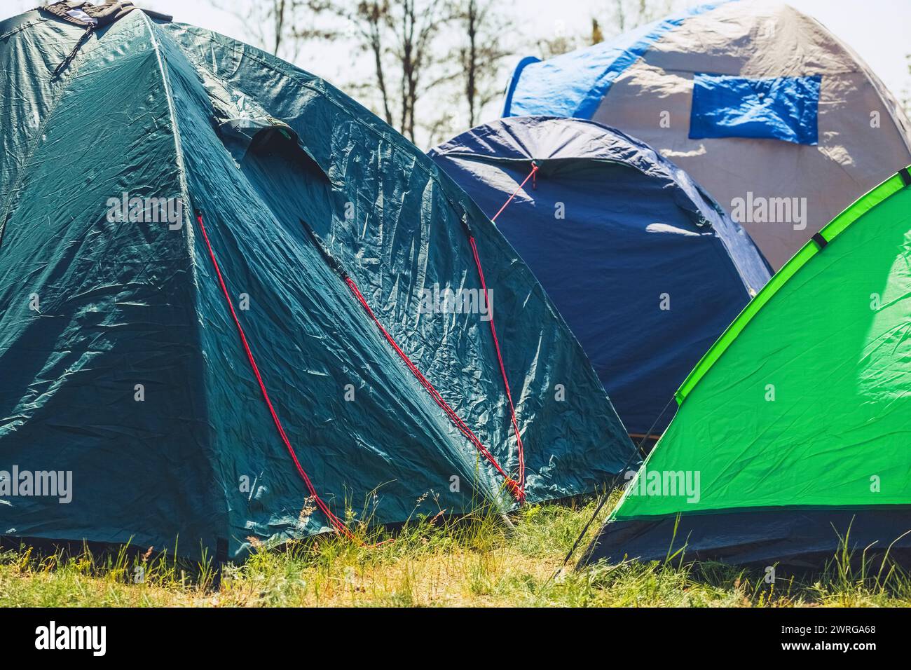 blue tents set tourists on the beach, on the sea coast Stock Photo - Alamy