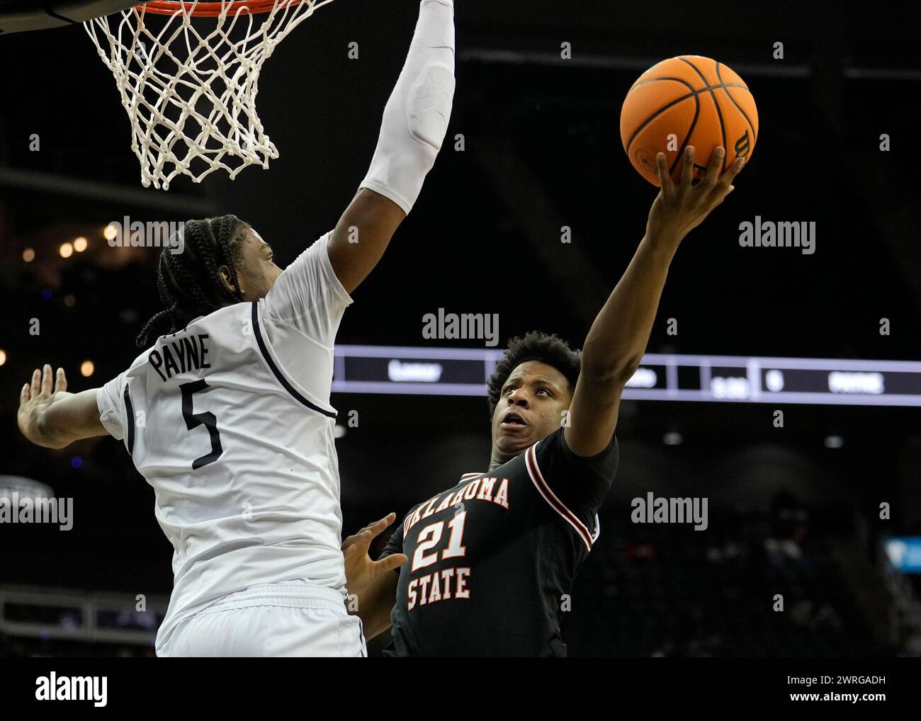 MAR 12 2024: Oklahoma State Cowboys forward Justin McBride (21) drive ...