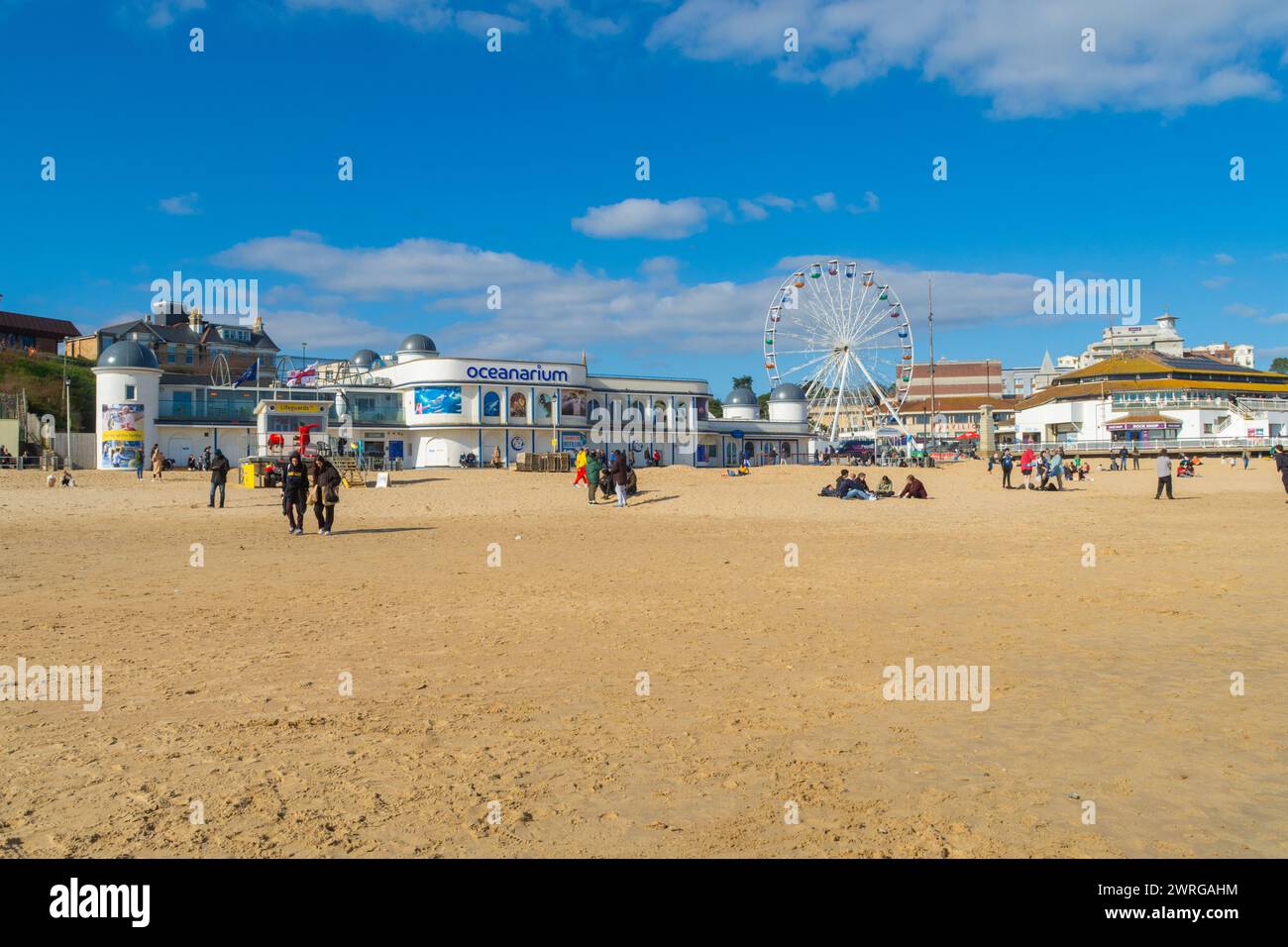 Bournemouth, UK - April 2nd 2023: People on the beach in front of the ...