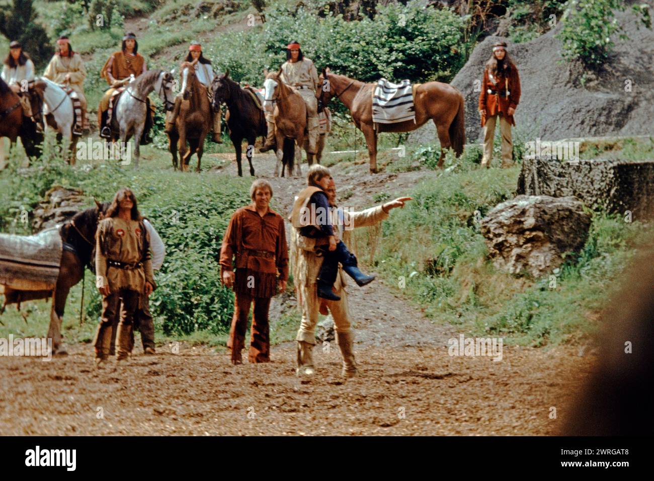 The actor Pierre Brice performing as Winnetou and other actors in the ...