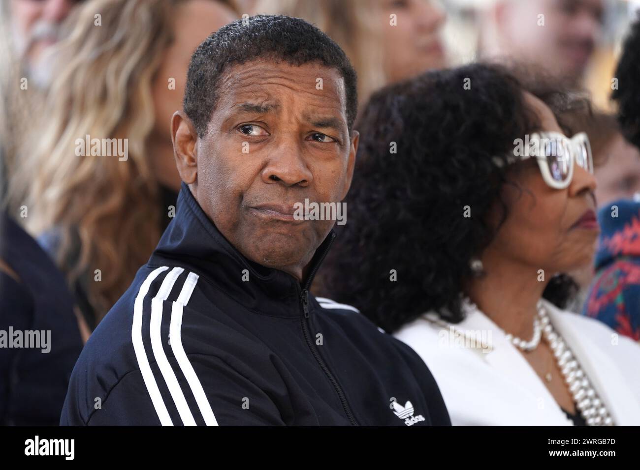 Denzel Washington attends a ceremony honoring Lenny Kravitz with a star ...