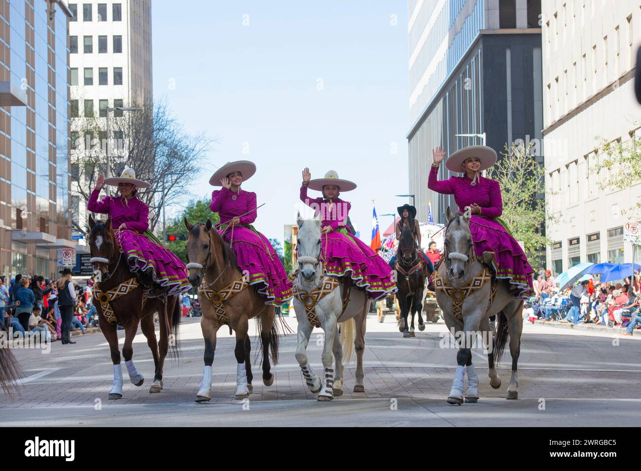 Mexican Women in traditional costume on horseback, rodeo parade in ...