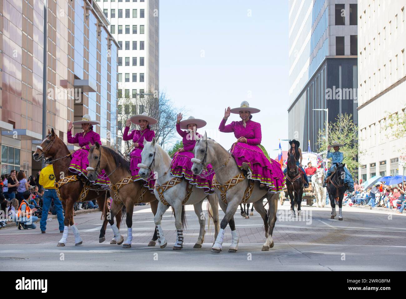Mexican Women in traditional costume on horseback, rodeo parade in ...
