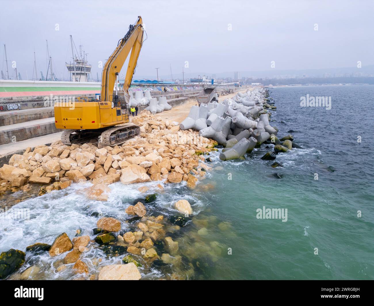 Rows of Concrete Blocks Along Beach Stock Photo - Alamy