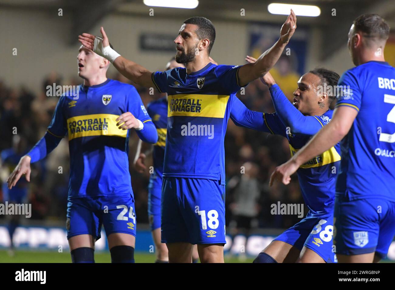 London, England. 12th Mar 2024. Omar Bugiel of AFC Wimbledon celebrates ...