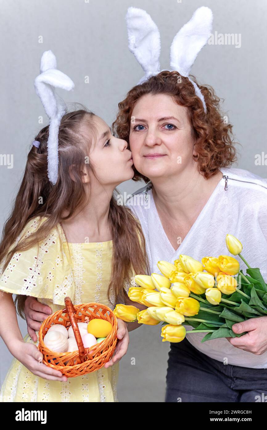 Happy holiday. A mother and her daughter celebrate Easter Stock Photo ...