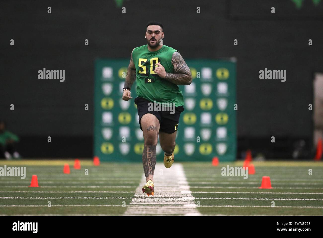 Oregon defensive tackle Popo Aumavae runs the 40-yard-dash at the school's NFL Pro Day, Tuesday ...