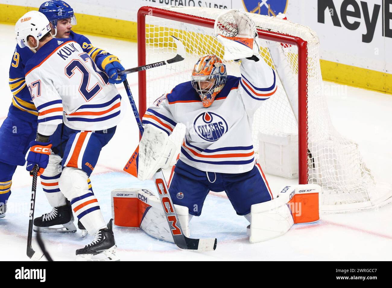 Edmonton Oilers goaltender Stuart Skinner (74) reaches for the puck ...