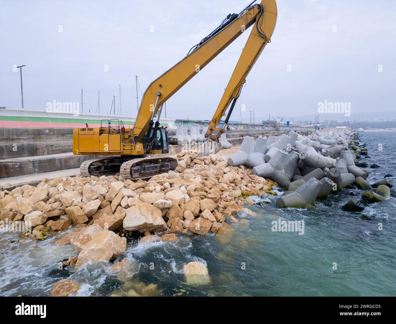 Rows of Concrete Blocks Along Beach Stock Photo - Alamy