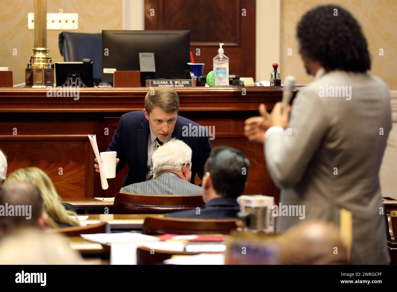 South Carolina Rep. Jordan Pace, R-Goose Creek, speaks to a colleague ...