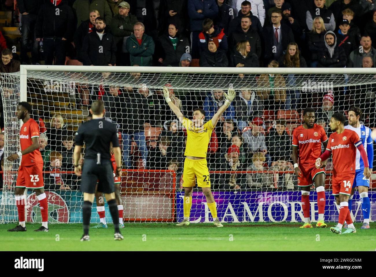 Walsall, UK. 12th Mar, 2024. Walsall's goalkeeper, Jackson Smith stands ...