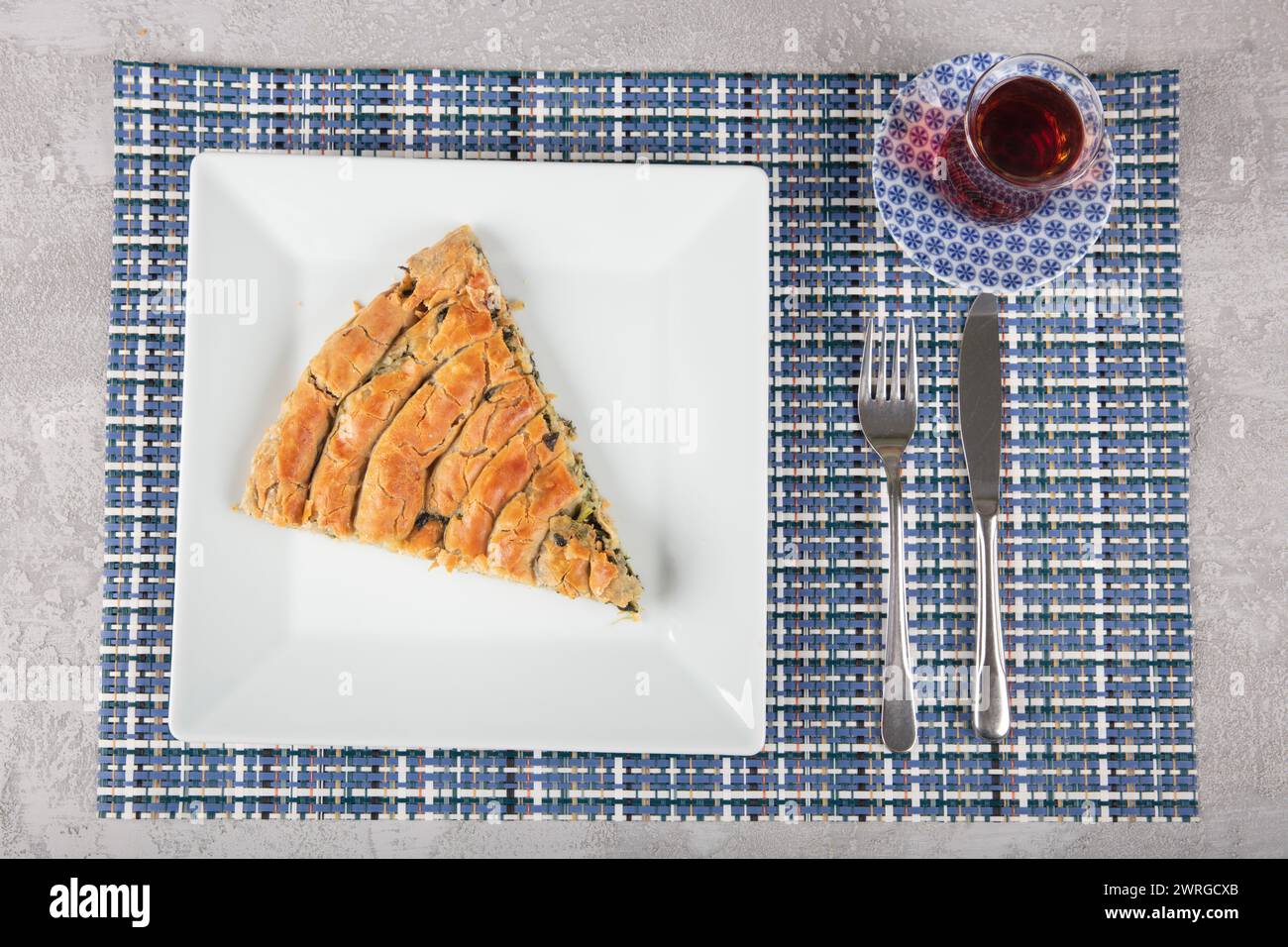 Delicious cake made of phyllo dough, decorated with sesame seeds ...