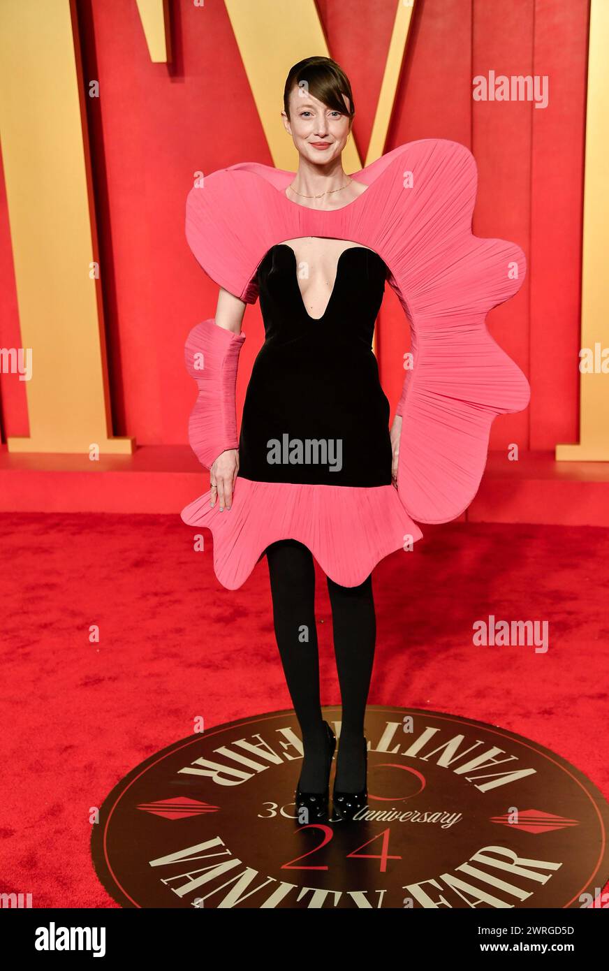 Andrea Riseborough arrives at the Vanity Fair Oscar Party on Sunday ...