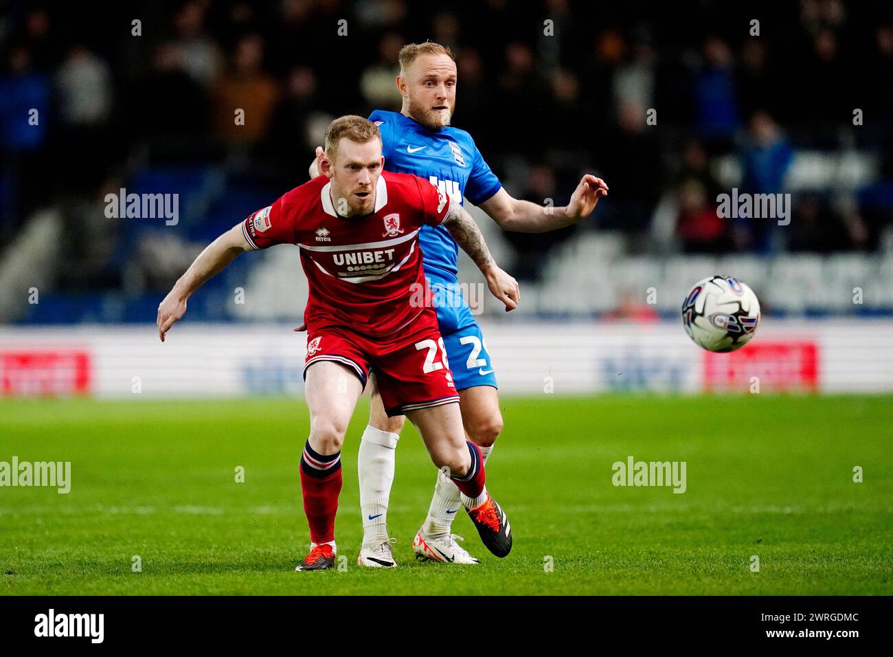 Middlesbrough's Lewis O'Brien (left) and Birmingham City's Alex ...