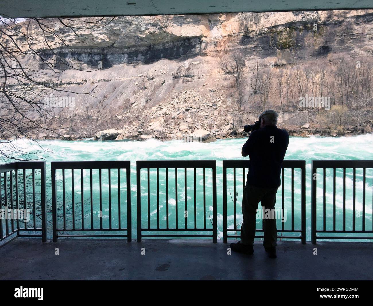 A photographer takes photos along Niagara River just below Niagara ...