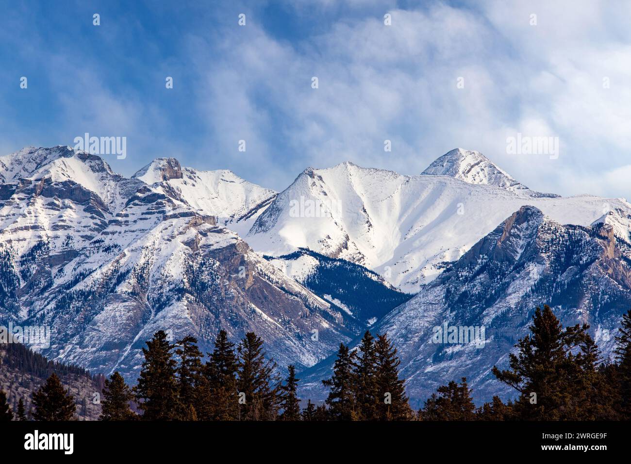 Snow-capped mountain peaks as seen from Banff National Park in the ...