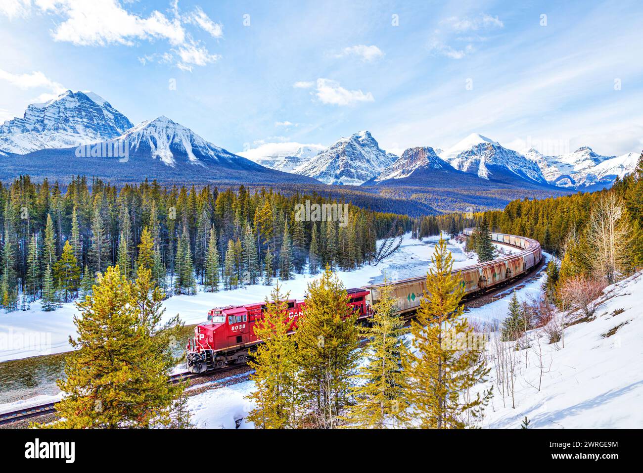 BANFF, CANADA - FEB. 22, 2024: Canadian Pacific Railway cargo train passes through Morant's ...