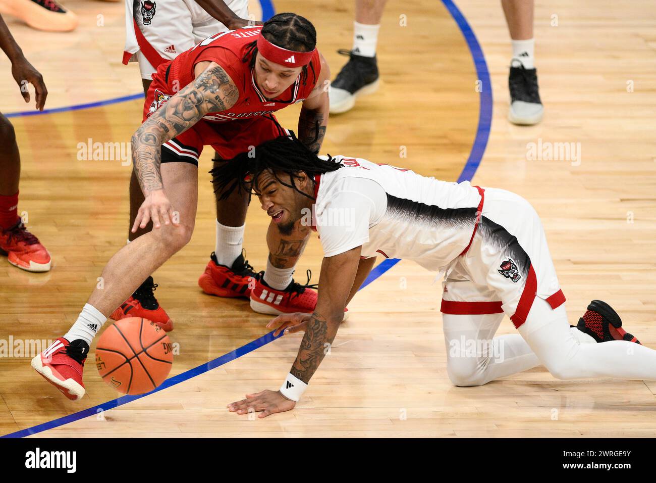 North Carolina State guard Jayden Taylor (1) loose control of the ball ...